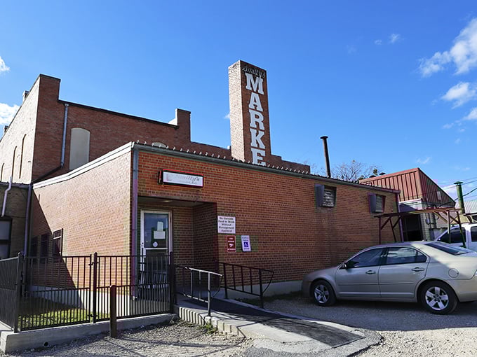 That weathered brick facade might fool you, but behind those walls lies barbecue gold.