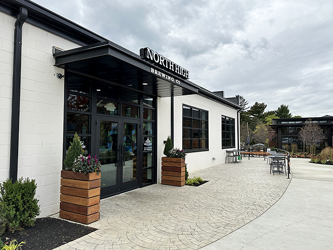 The sleek exterior of North High Brewing beckons like a modern-day oasis for the thirsty traveler. Clean lines and wooden planters promise good things inside.