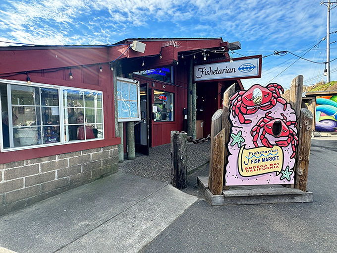 The little red shack that could! Fishetarian's cheerful exterior with its whimsical crab sign promises seafood treasures that would make Neptune himself line up.