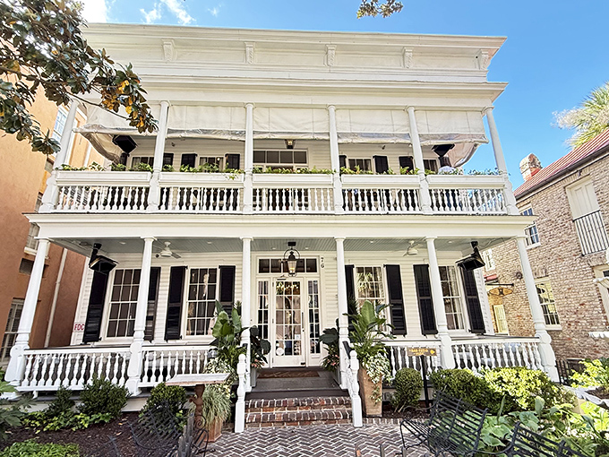 Southern charm incarnate! Husk's pristine white Victorian facade invites you into a culinary time machine where history and innovation share the dinner table.