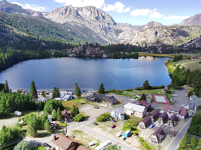 Paradise from above! June Lake's azure waters and mountain backdrop create a scene that makes even seasoned travelers stop mid-sentence and just stare.