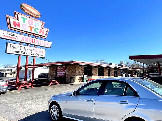 That iconic neon sign isn't just advertising&mdash;it's a time portal to when drive-ins ruled and chrome-trimmed cars were kings of the road. 