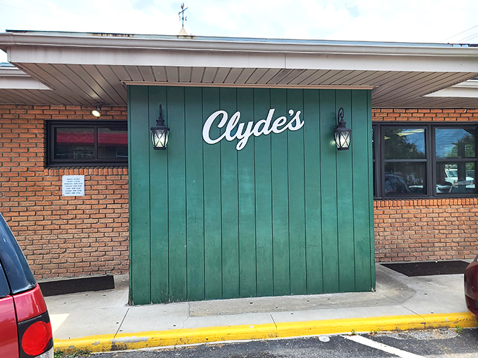 The unassuming brick exterior of Clyde's might not scream "culinary destination," but those hanging ferns and colorful windows whisper, "Come on in, hungry traveler."