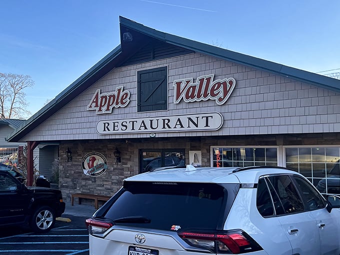 The iconic peaked roof of Apple Valley Restaurant stands like a culinary lighthouse, beckoning hungry travelers with promises of comfort food paradise in Milford.