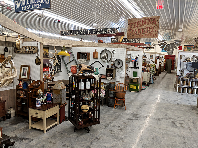 A treasure hunter's paradise! Rows of vintage stoneware crocks and jugs stand at attention like ceramic soldiers waiting to be drafted into service in a modern home.