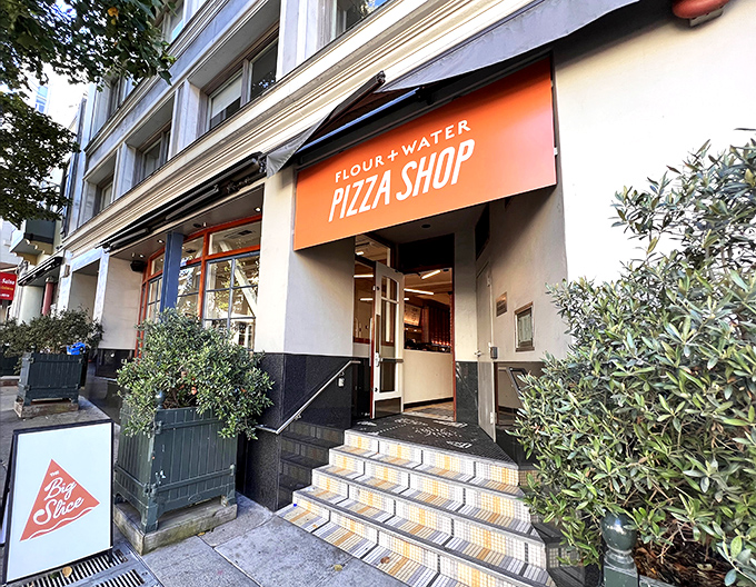 The bright orange sign beckons like a pizza lighthouse in San Francisco's Mission District. Simple, unpretentious, and promising delicious things inside.