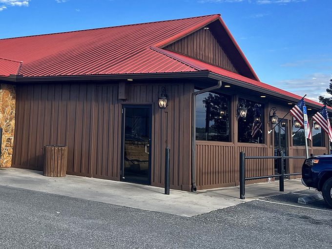 The rustic wooden exterior with its signature red roof isn't trying to impress anyone&mdash;until you taste what's happening inside. Florida barbecue with purpose.