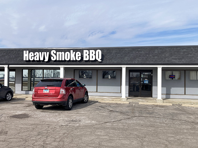 The unassuming strip mall exterior of Heavy Smoke BBQ proves once again that the best barbecue joints often hide in plain sight, waiting to reward the truly dedicated meat seekers.