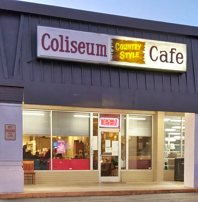 Classic Americana at its finest! The vintage car parked outside Coliseum Country Cafe perfectly complements this unassuming Greensboro treasure where culinary magic happens daily.