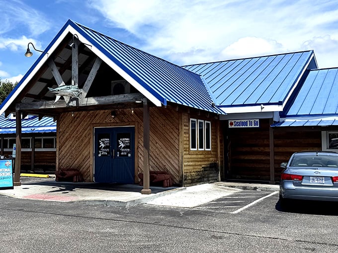 That blue metal roof and wooden siding aren't just coastal charm&mdash;they're a beacon calling seafood lovers home to Newport News.
