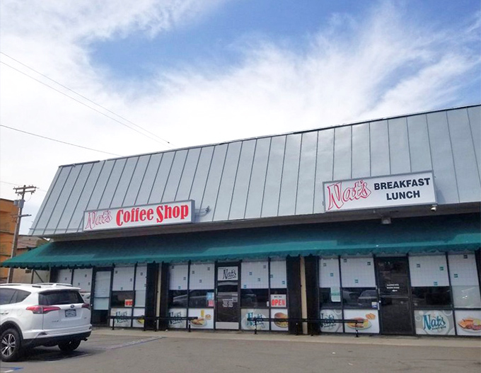 The unassuming exterior of Nat's Early Bite in Sherman Oaks &ndash; where breakfast dreams come true behind a modest storefront that screams "locals know best."