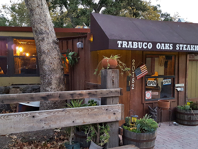 The rustic charm of Trabuco Oaks Steakhouse beckons from the canyon, like a delicious secret waiting to be discovered by hungry travelers.