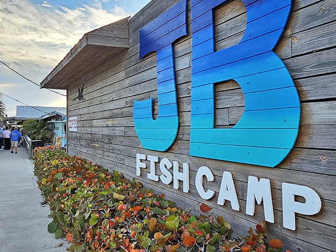 The weathered wooden exterior with its gradient blue "JB" sign isn't trying to impress anyone&mdash;which is exactly how you know the food inside will be spectacular.