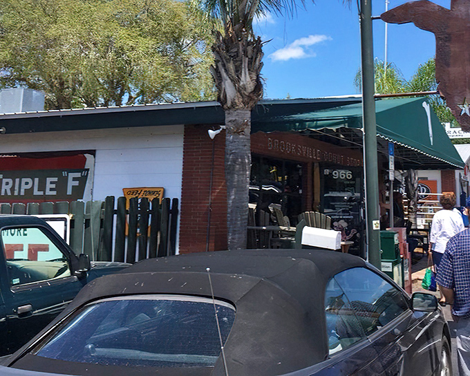 The vintage pickup truck outside Florida Cracker Kitchen isn't just decoration—it's a time machine to Old Florida, complete with authentic rust and character.