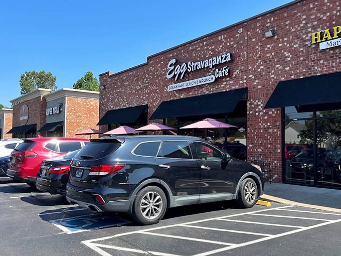The unassuming brick exterior hides culinary treasures within, like finding a Michelin star in a strip mall. Those black awnings? They're practically waving you in.