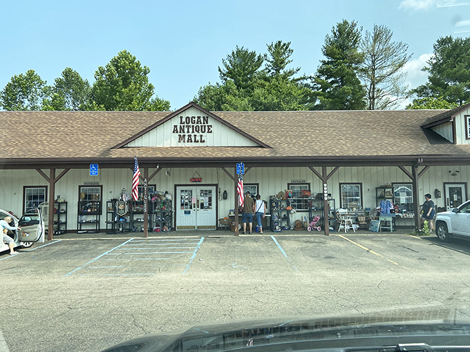 The welcoming exterior promises treasures within, where American flags flutter over displays that hint at countless stories waiting inside.