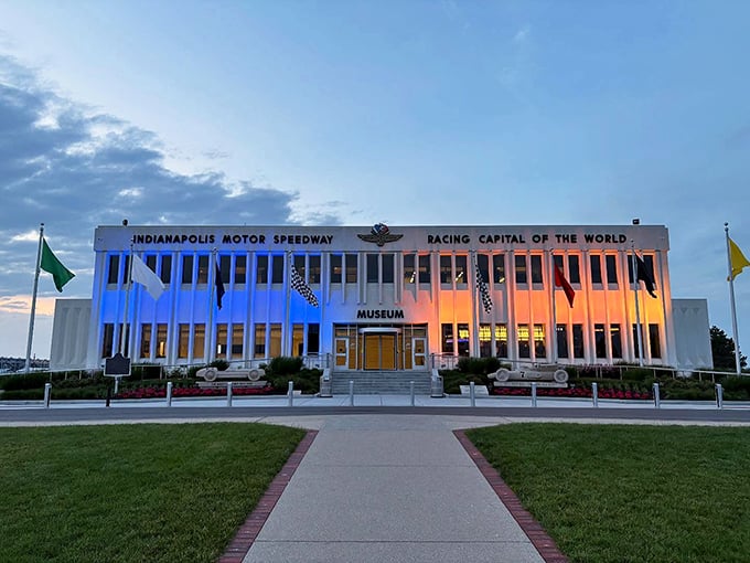 The modernist fa&ccedil;ade of the Indianapolis Motor Speedway Museum stands proudly as the guardian of racing history, with A.J. Foyt's 1970 winner immortalized in concrete out front.