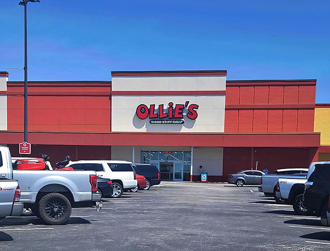 The iconic red and white facade of Ollie's beckons like a retail lighthouse, promising treasure hunters the thrill of the bargain chase.