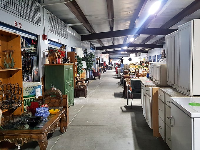 Long corridors of possibility stretch before you, where vintage furniture and cabinets stand like sentinels guarding treasures waiting to be discovered.