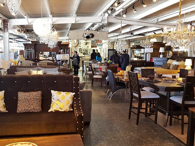 Chandeliers that would make Liberace jealous hang above an impressive furniture showroom where yesterday's living rooms await tomorrow's memories.