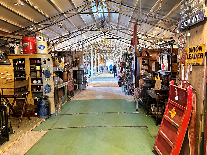 The green-floored corridor of possibility stretches before you, lined with treasures waiting to be discovered. Every vendor stall is its own universe of potential finds.