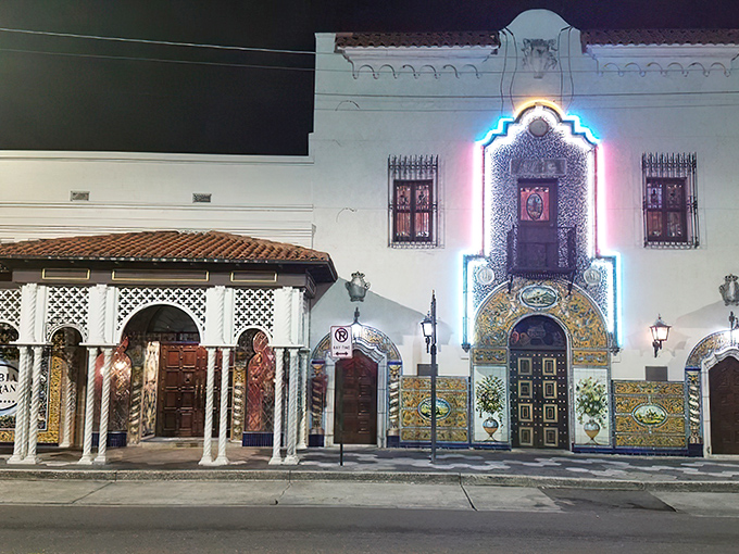 The Columbia's fa&ccedil;ade glows like a Spanish palace at night, its ornate tilework and dramatic lighting beckoning hungry travelers like a culinary lighthouse.