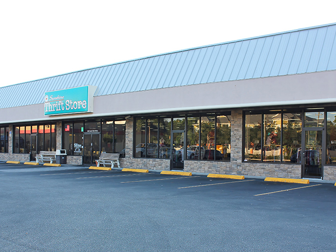 The iconic turquoise sign glows like a beacon for bargain hunters. Sunshine Thrift Store's flamingo logo promises Florida treasures without the tourist prices.