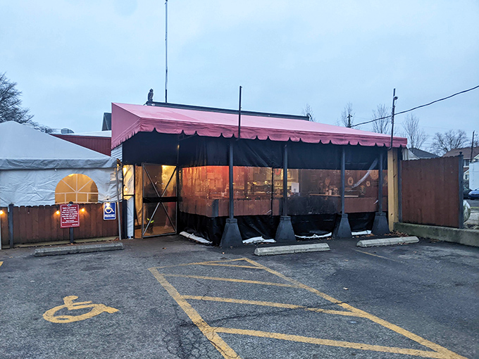 The unassuming red exterior with its cheerful pink awning is like finding a secret treasure map&mdash;X marks the spot for breakfast bliss.