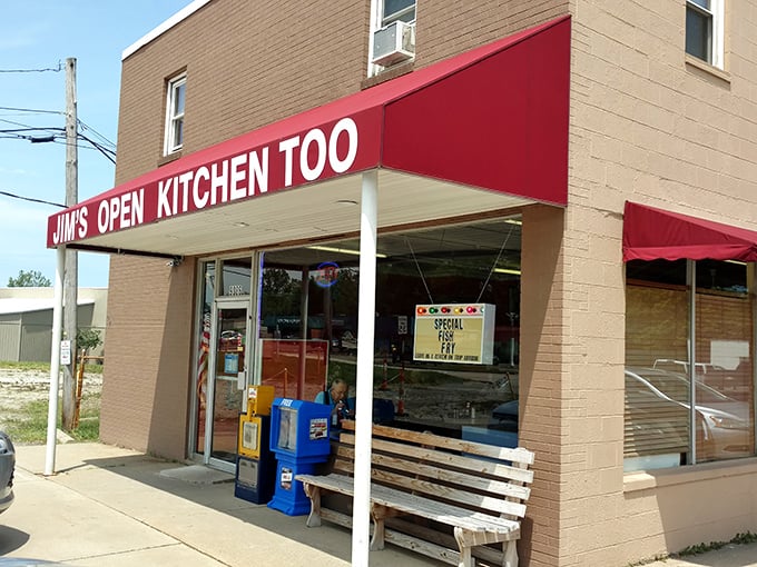 The iconic red awning of Jim's Open Kitchen Too stands as a beacon of breakfast hope on an otherwise ordinary Streetsboro street corner.