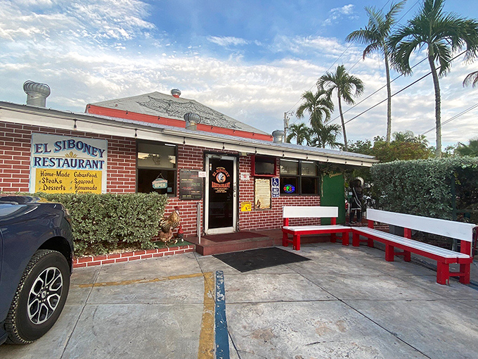 The unassuming brick exterior of El Siboney hides culinary treasures within—like finding a vintage Rolex at a yard sale.