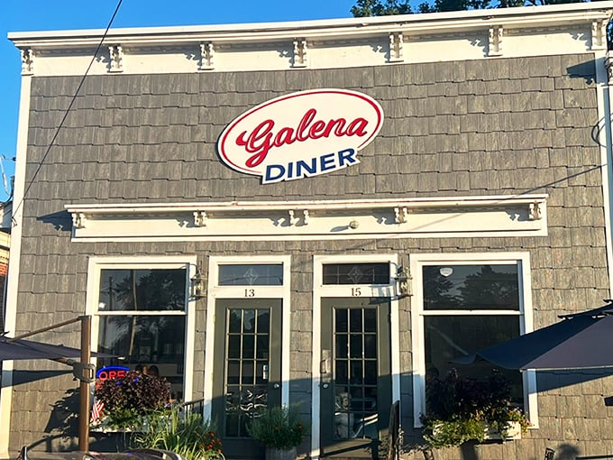 The classic gray-shingled exterior with that iconic red sign promises comfort food nirvana. Small-town charm, big-time flavors await inside.