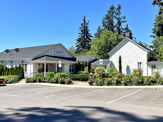 The white farmhouse exterior of Filberts beckons like a culinary lighthouse amid Aurora's greenery, promising comfort and class in equal measure.