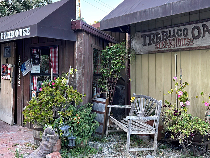 The rustic charm of Trabuco Oaks Steakhouse beckons from the canyon, like a delicious secret waiting to be discovered by hungry travelers.