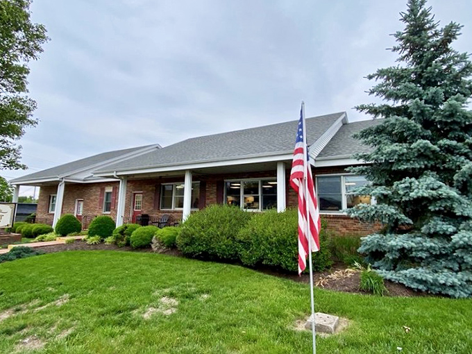 The unassuming brick exterior of Bill's Donut Shop stands like a temple to fried dough, complete with American flag &ndash; patriotism never tasted so sweet.
