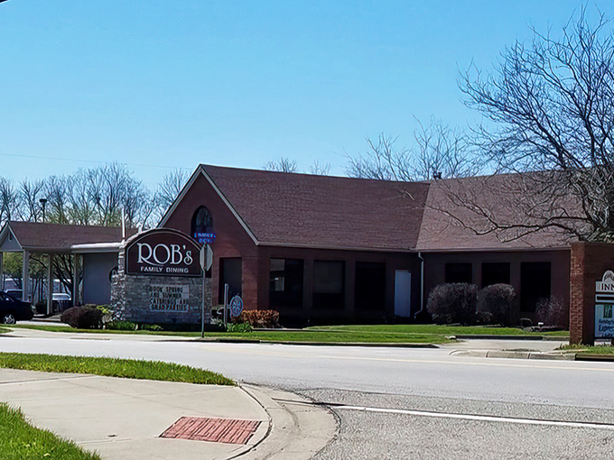 The brick exterior whispers "come in" while the landscaping practically shouts "we care about details here."