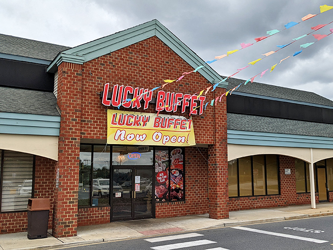 The bright red "Lucky Buffet" sign beckons hungry travelers like a lighthouse for the famished. Those colorful pennants aren't just decoration&mdash;they're celebration flags.