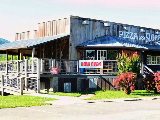 The rustic wooden exterior of Sloppy Hog stands like a delicious mirage against the Smoky Mountain backdrop, promising comfort food that'll make your cardiologist wince with delight.