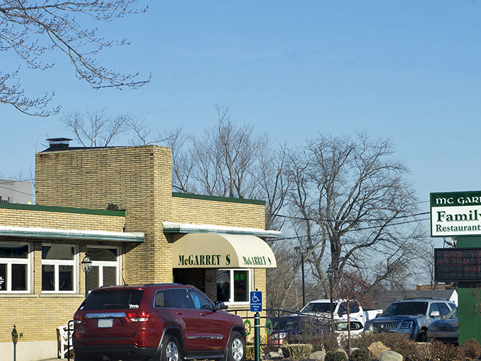 The unassuming yellow brick exterior of McGarrey's Oakwood Cafe stands like a beacon of culinary promise in Erie. No fancy frills, just fantastic food awaiting inside.