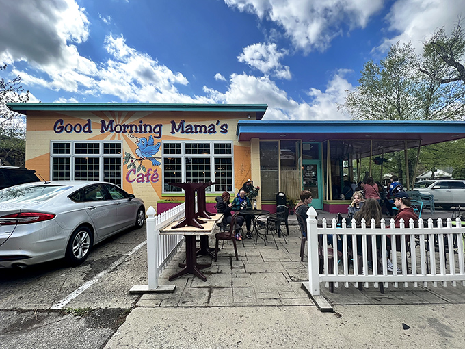 The cheerful exterior of Good Morning Mama's beckons like a colorful oasis in Indianapolis, complete with whimsical signage and that charming white picket fence.