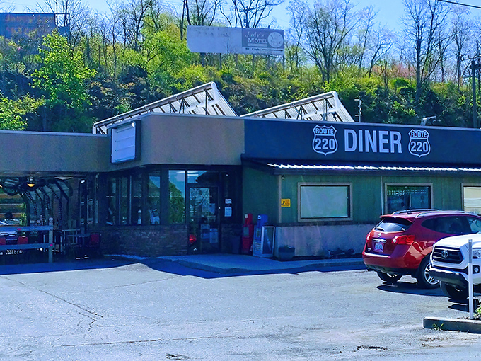 The unassuming exterior of Route 220 Diner stands like a beacon for hungry travelers – proof that culinary treasures often hide in plain sight.