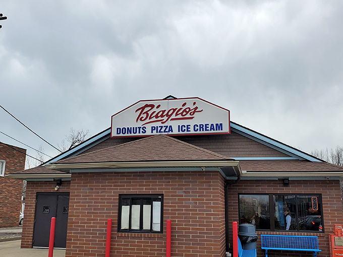 The unassuming brick fortress of flavor announces its holy trinity right on the sign: donuts, pizza, ice cream. Culinary simplicity at its finest. 