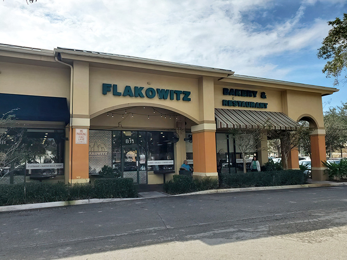 The unassuming exterior of Flakowitz belies the culinary treasures within. Like finding a Rolex in a cereal box, this strip mall gem delivers big on flavor.