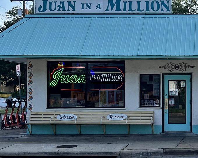 The neon sign beckons like an old friend &ndash; "Juan in a Million" glows against the simple white exterior, while the "World Famous" bench outside tells you everything you need to know.