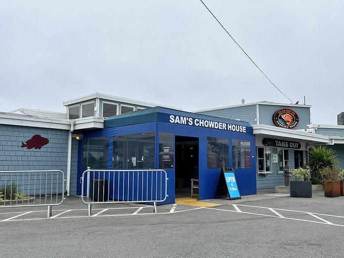 The blue facade of Sam's Chowder House stands like a beacon of seafood salvation on the Half Moon Bay coastline.