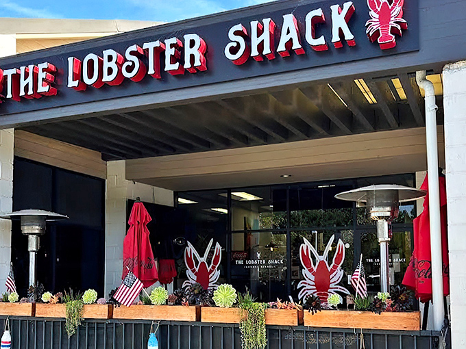 The red lobster signs flanking the entrance aren't just decoration&mdash;they're beacons calling to seafood lovers like maritime lighthouses guiding hungry sailors home.