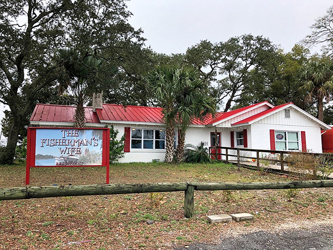 A humble white cottage with a cheerful red roof that proves the old adage: the less fancy the building, the more spectacular the seafood inside.