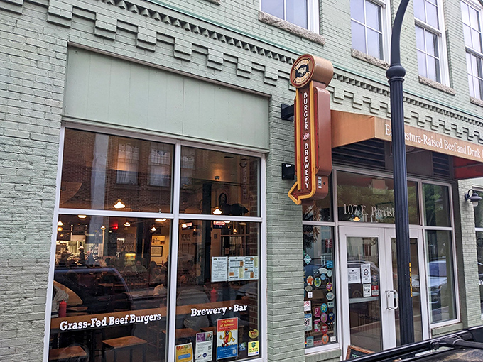 The mint-green facade of Bull City Burger and Brewery beckons hungry passersby with promises of grass-fed beef burgers and craft brews in downtown Durham.
