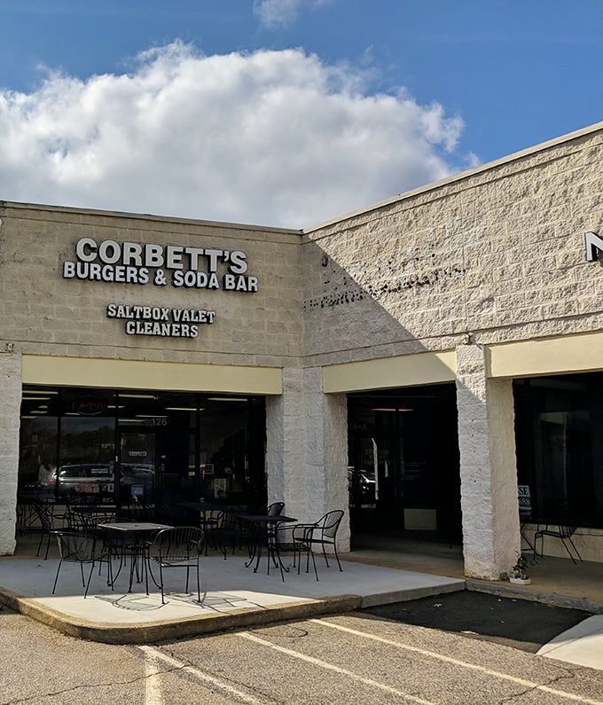 Unassuming strip mall treasure with bright red umbrellas beckoning you in&mdash;proof that culinary gems often hide in plain sight.