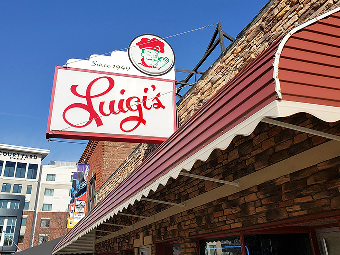 Luigi's iconic storefront stands like a time capsule on Akron's South Main Street, its vintage sign promising Italian comfort that generations have trusted.