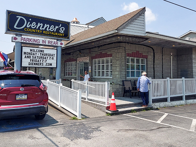 The glowing sign of Dienner's Country Restaurant beckons hungry travelers like a lighthouse for comfort food enthusiasts navigating the sea of Pennsylvania Dutch Country.